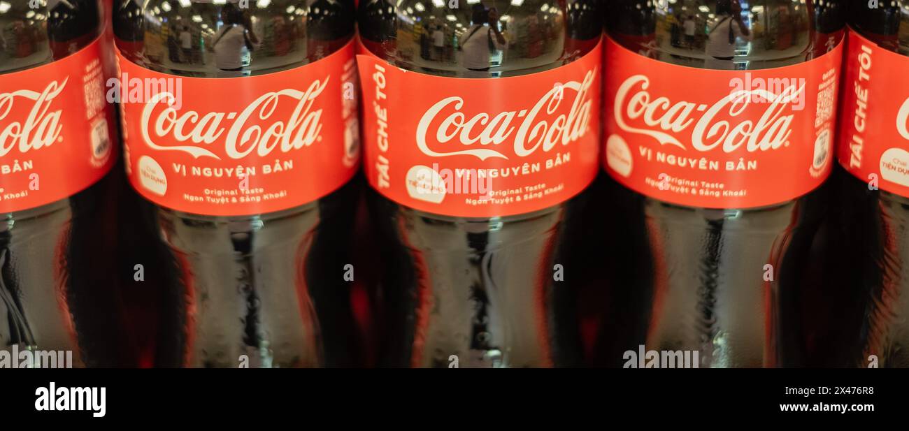 Coca cola in plastic bottles in Vietnam. Original taste. Soft drink ...