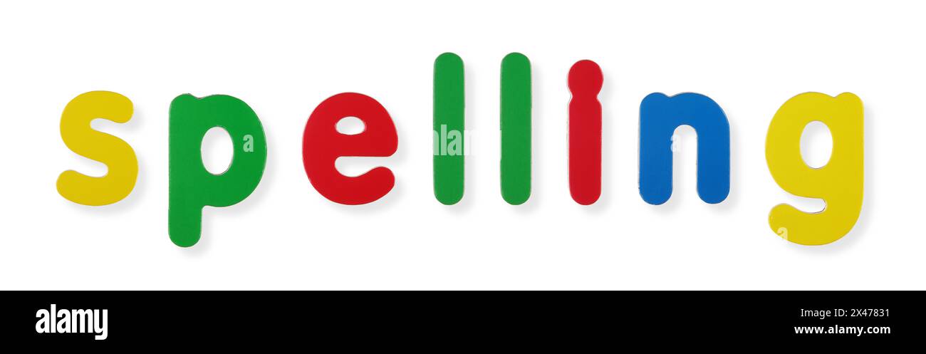 Spelling word in coloured magnetic letters Stock Photo - Alamy