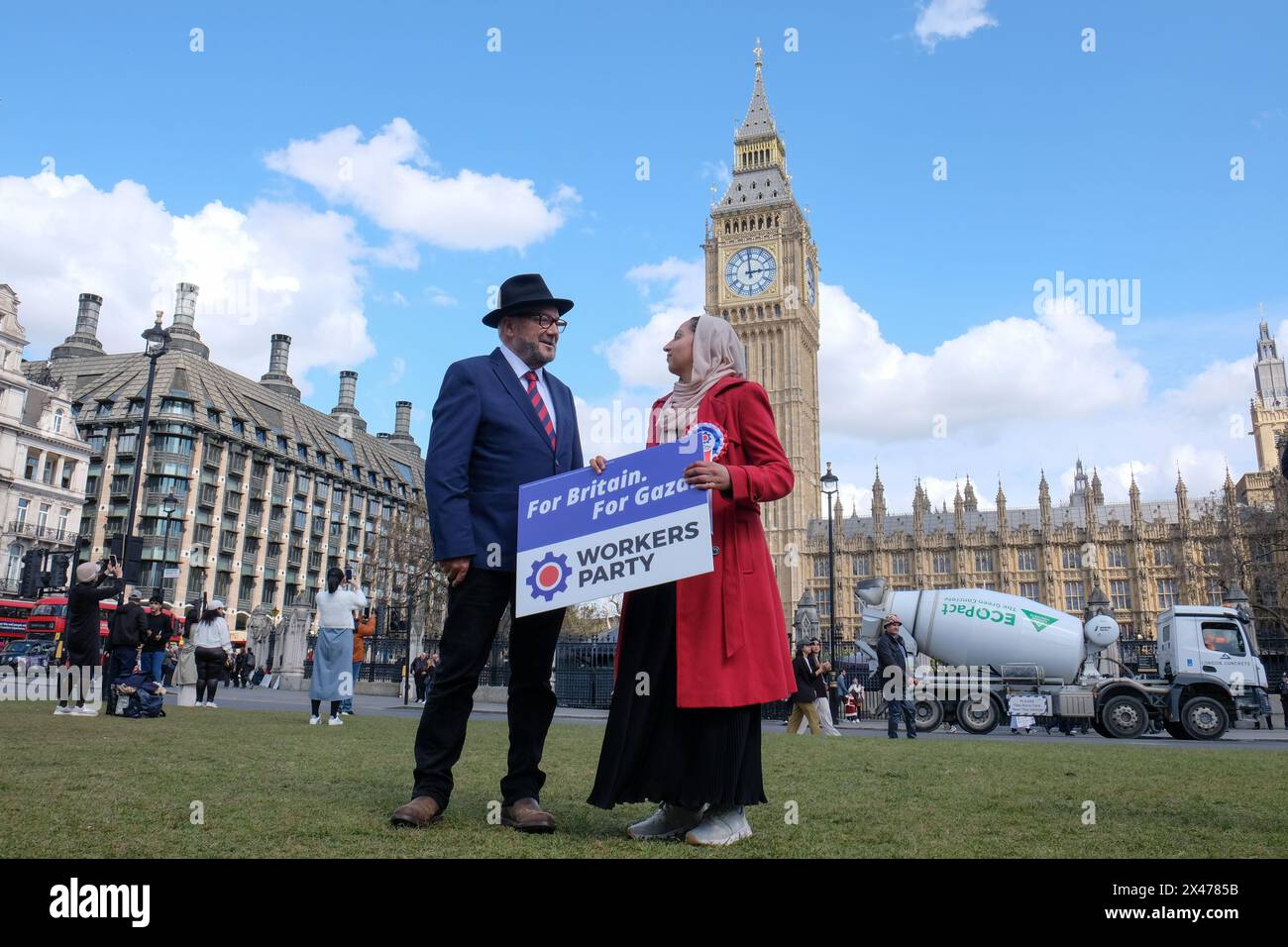 George Galloway poses for a photo with a Workers Party of Britain ...