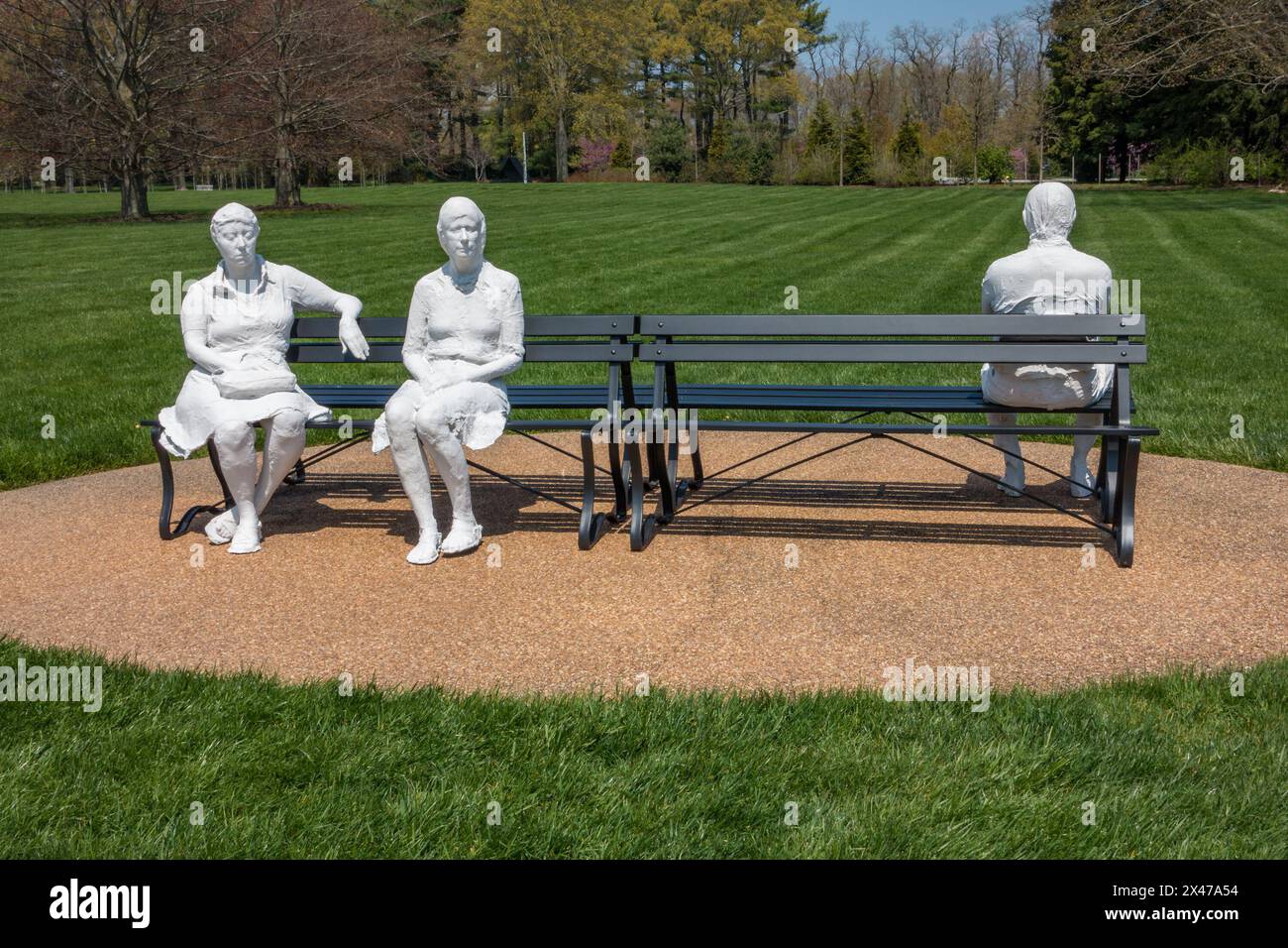 Three people on four benches hi-res stock photography and images - Alamy