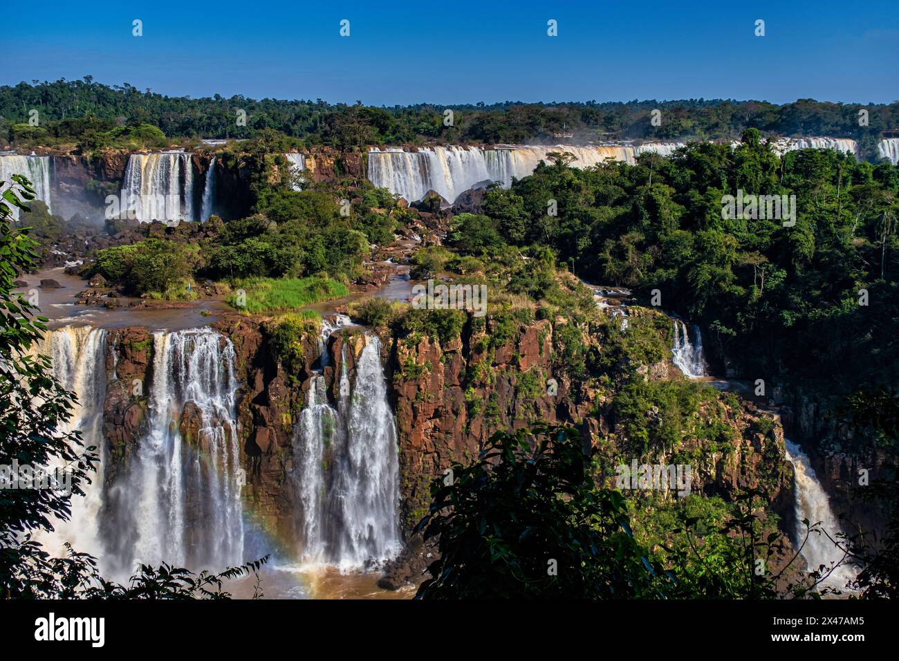Lying on the border of Brazil and Argentina, Iguacu Falls was born ...