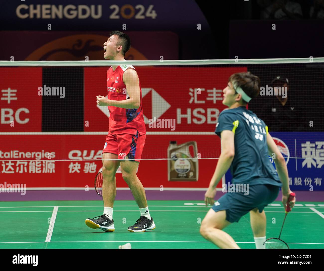 Beijing, China's Sichuan Province. 30th Apr, 2024. Lu Guangzu (L) of ...