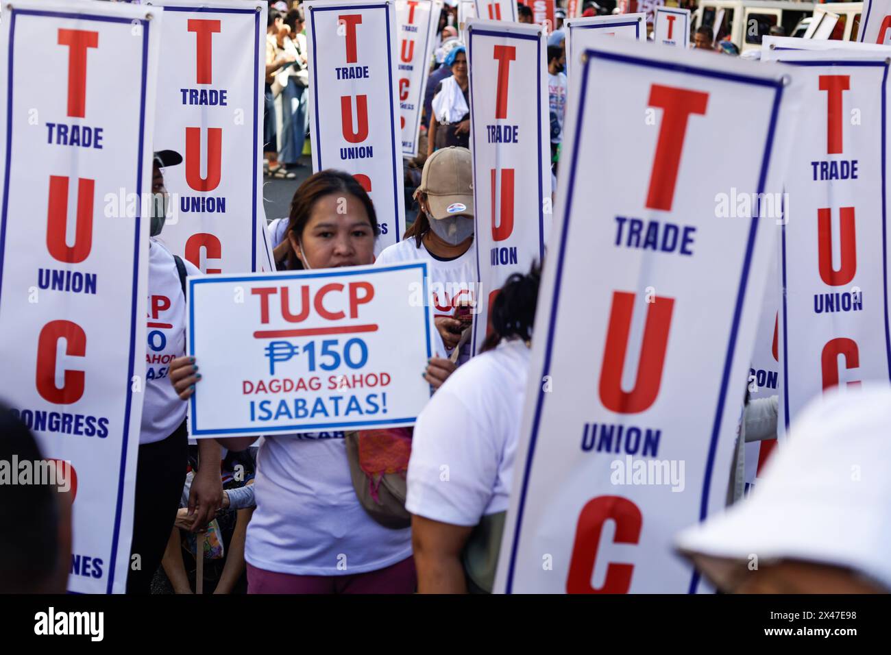 Manila, The Philippines. 1st May, 2024. Protesters with placards ...