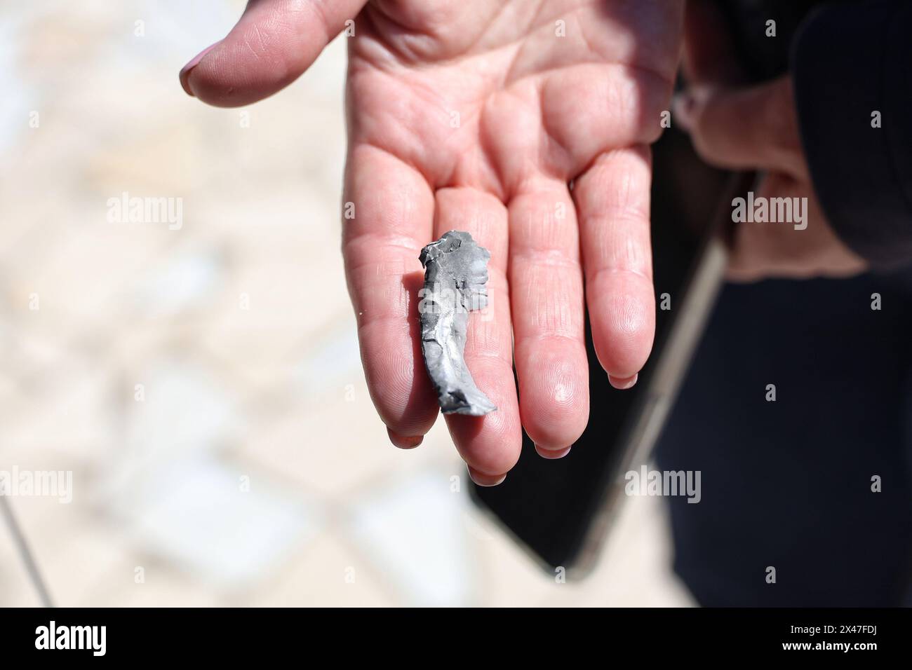 Non Exclusive: ODESA, UKRAINE - APRIL 30, 2024 - A woman shows a ...