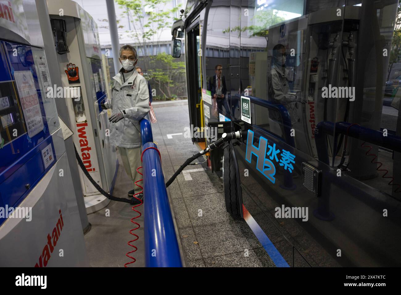Tokyo, Japan. 19th Apr, 2024. Fuel cell bus gets refueled at a hydrogen ...