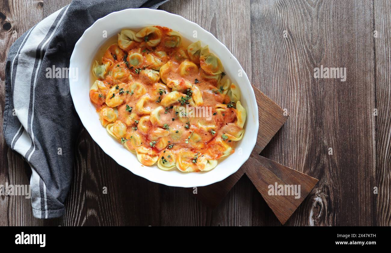 Tortelloni pasta witch riccota , spinach and creamy tomato sauce Stock ...