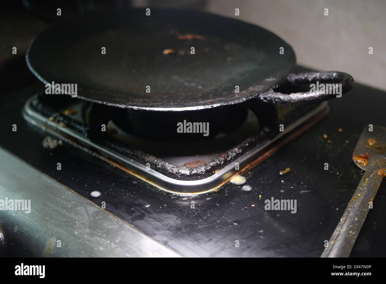 dirty and messy LPG gas stove Stock Photo - Alamy