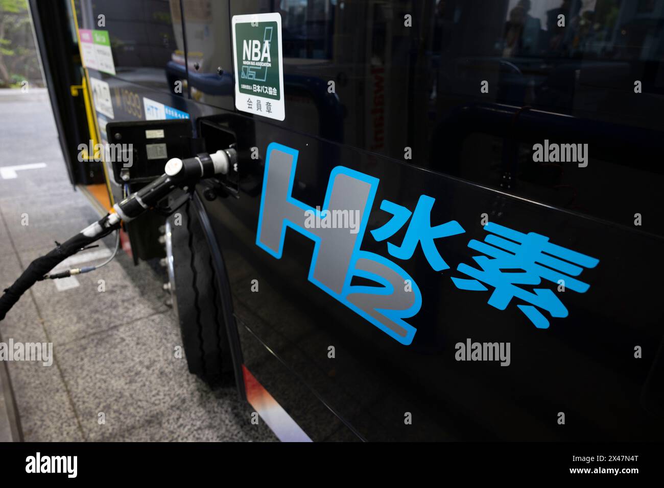 Tokyo, Japan. 19th Apr, 2024. Fuel cell bus gets refueled at a hydrogen ...