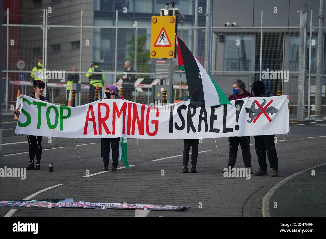 Protesters form a blockade outside weapons manufacturer BAE Systems in ...