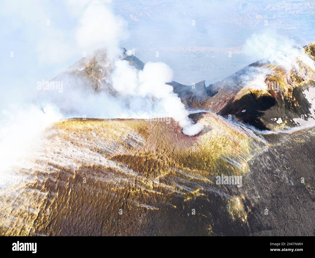 AERIAL VIEW. The summit of Mount Etna with the Southeast and New ...