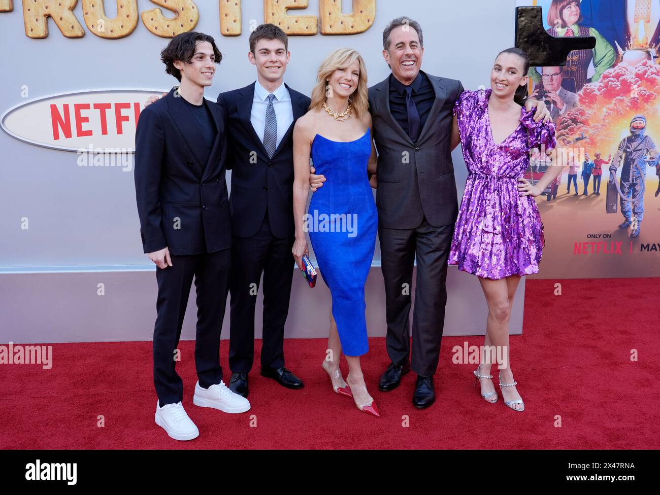 Jerry Seinfeld, second from right, and his wife Jessica, center, pose ...
