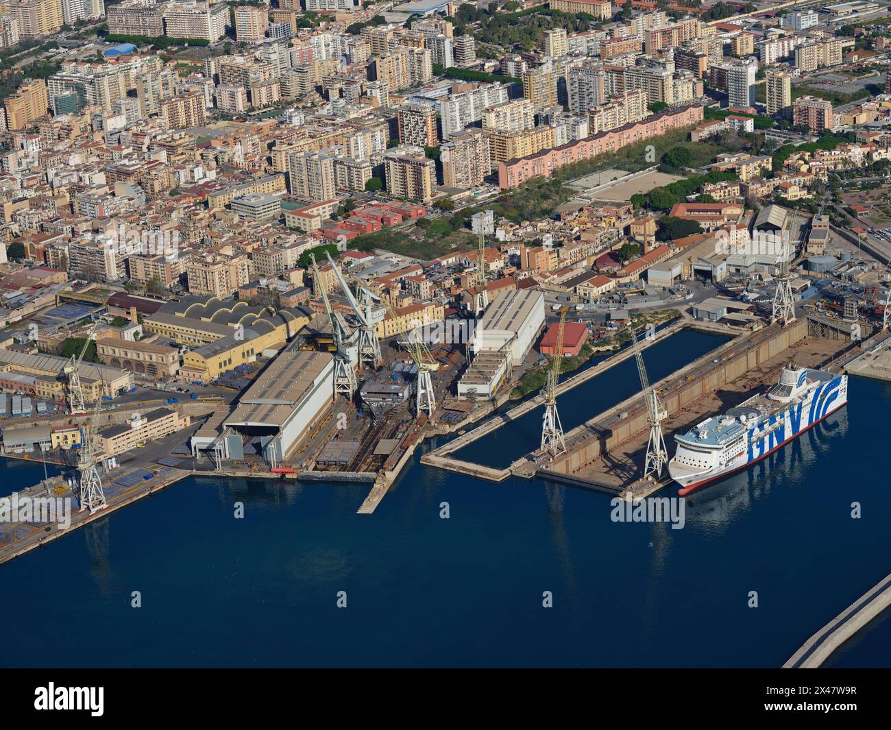 AERIAL VIEW. The harbor of Palermo with the shipyard and graving dock ...