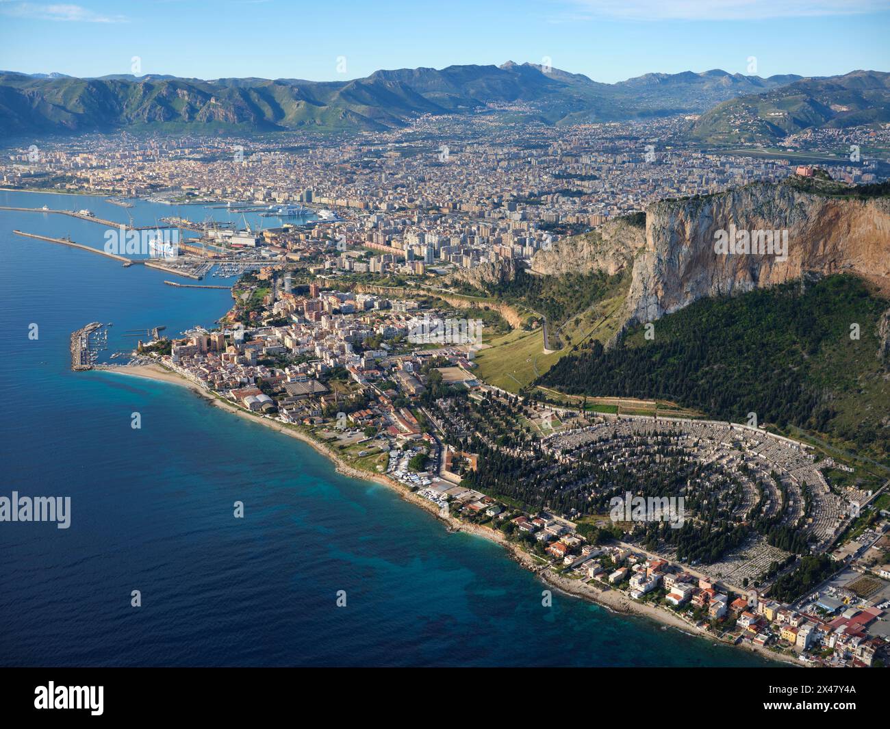 AERIAL VIEW. Monte Pellegrino with the city of Palermo in the distance ...