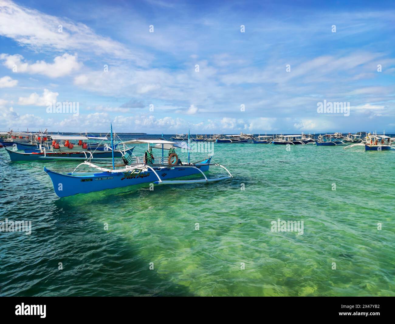 Tourist boats docked in Siargao Tourism port ready to take local and ...