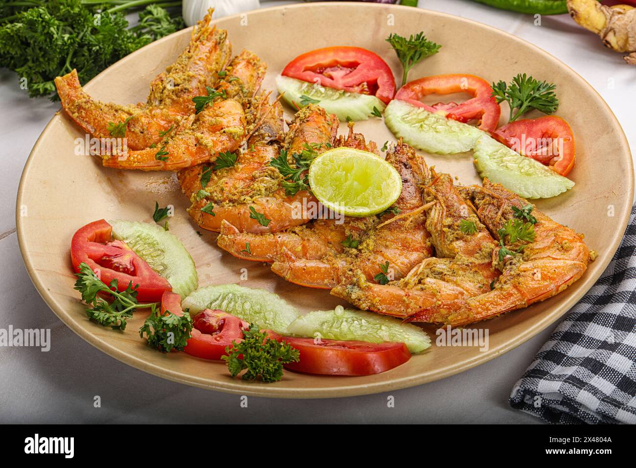 Grilled tiger prawn served lime and vegetables Stock Photo - Alamy