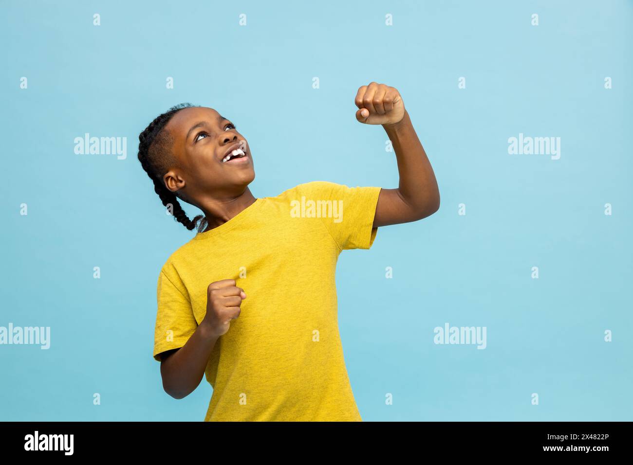 Excited cute school age african hi-res stock photography and images - Alamy