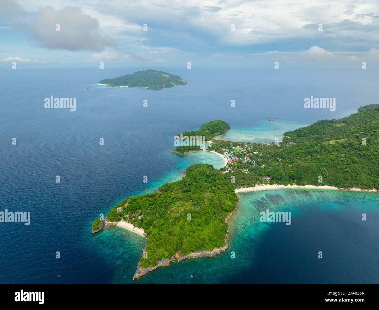 Tropical Islands with white sand beaches and blue sea with corals ...