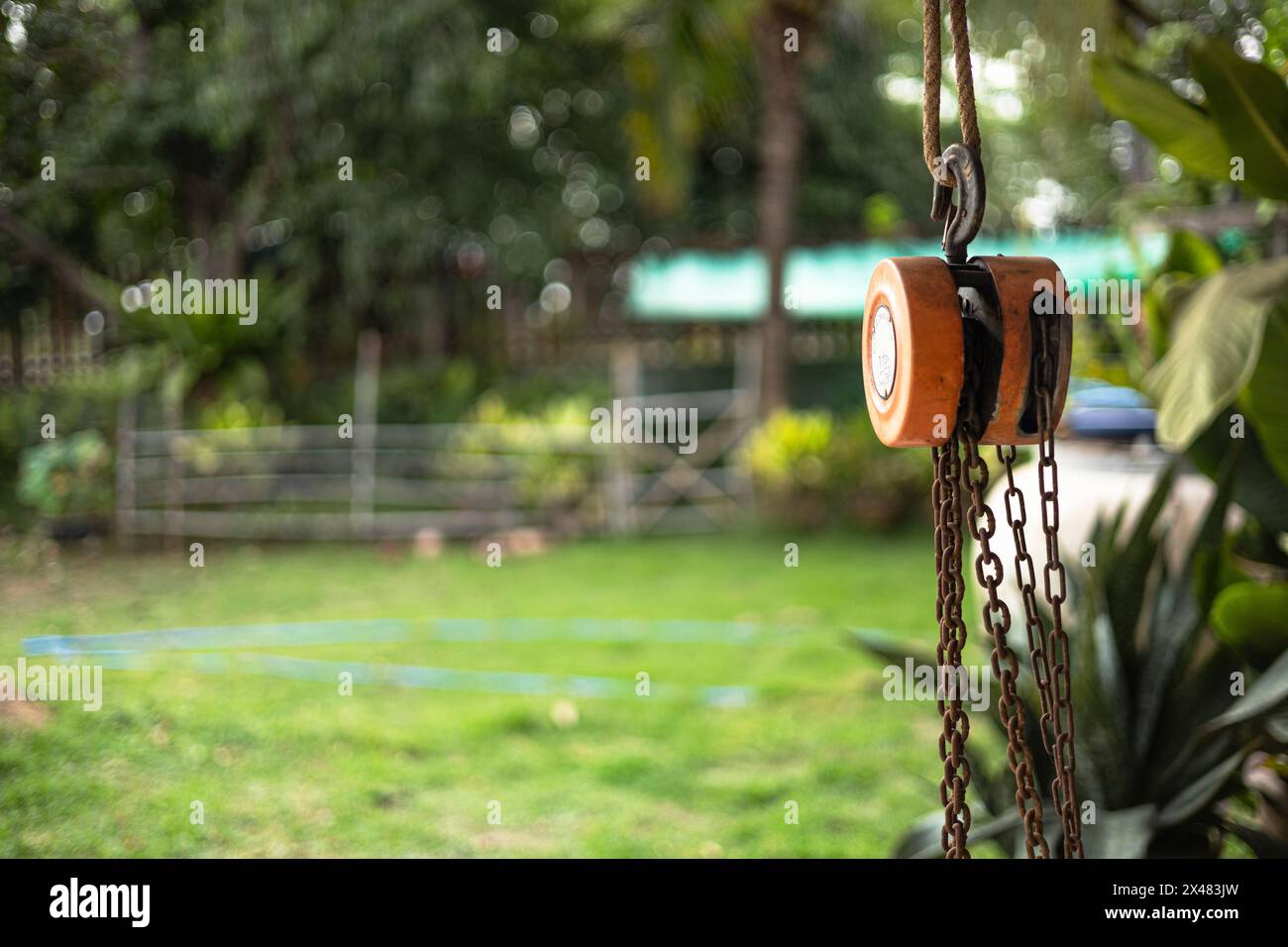 Rusty industrial chain hoist for reduce working load and lifting heavy ...