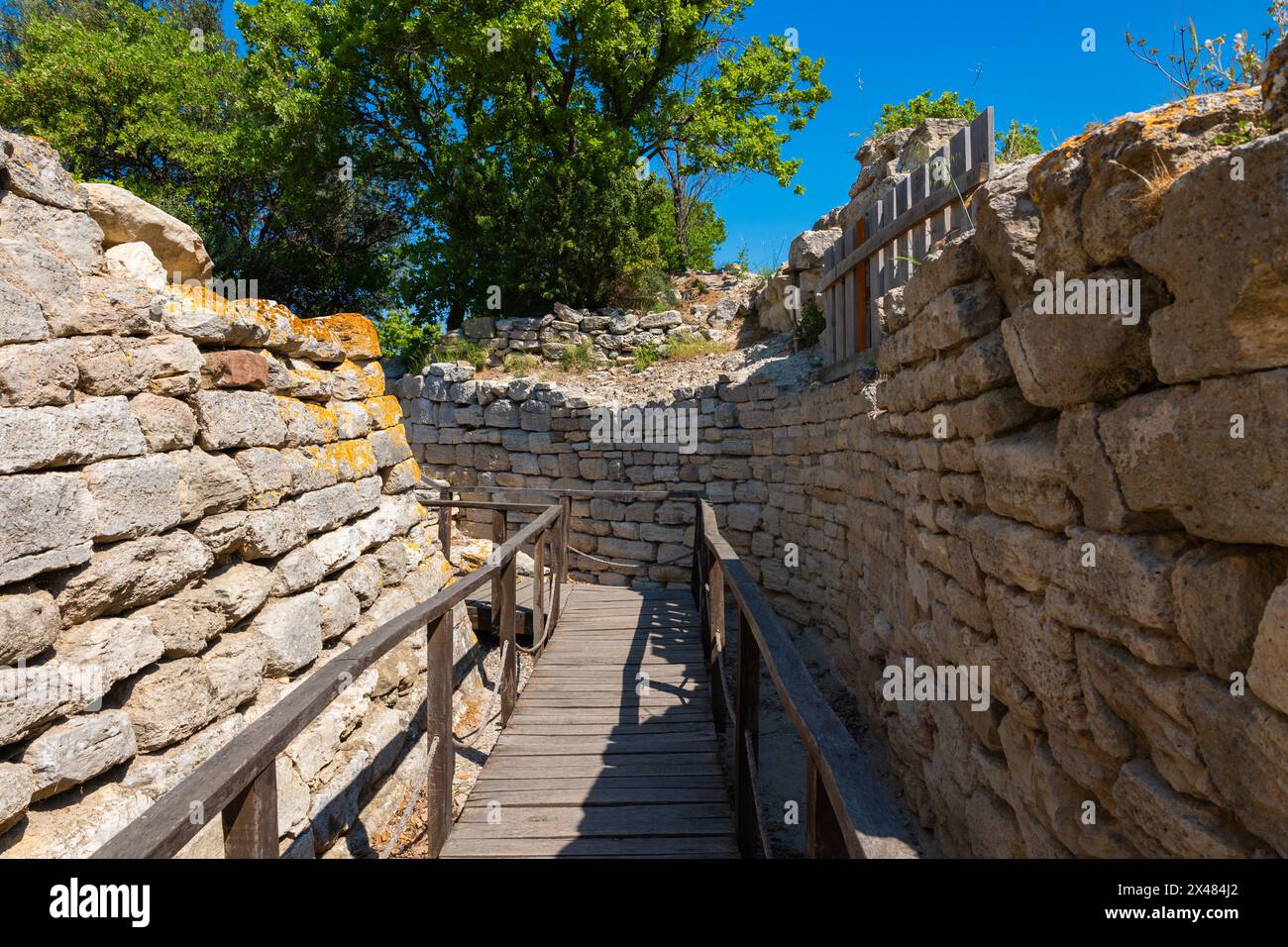 A wooden walkway in the ruins of Troy Ancient city in Canakkale Turkiye ...