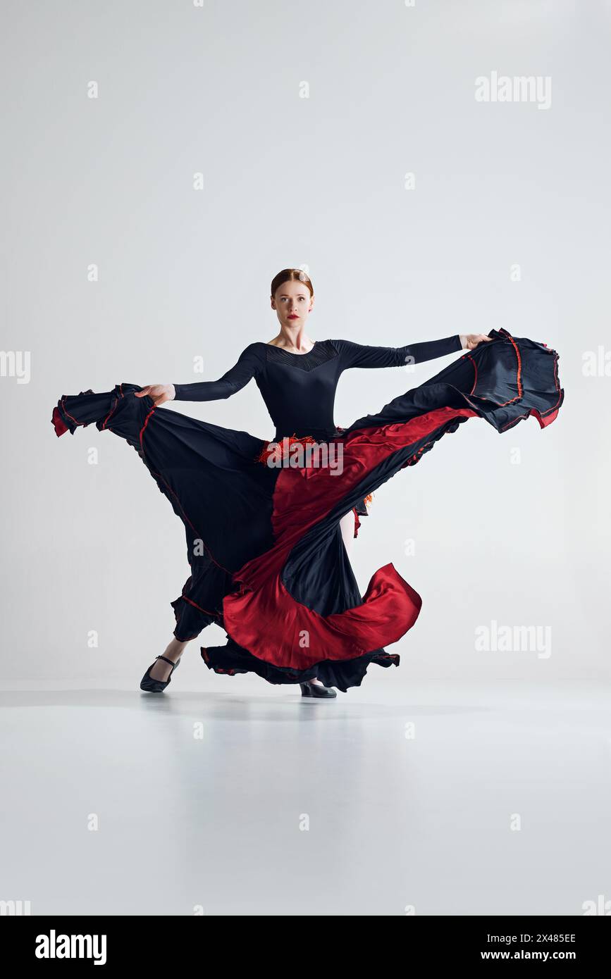 Passionate essence of flamenco dance. Artistic woman performing dynamic ...