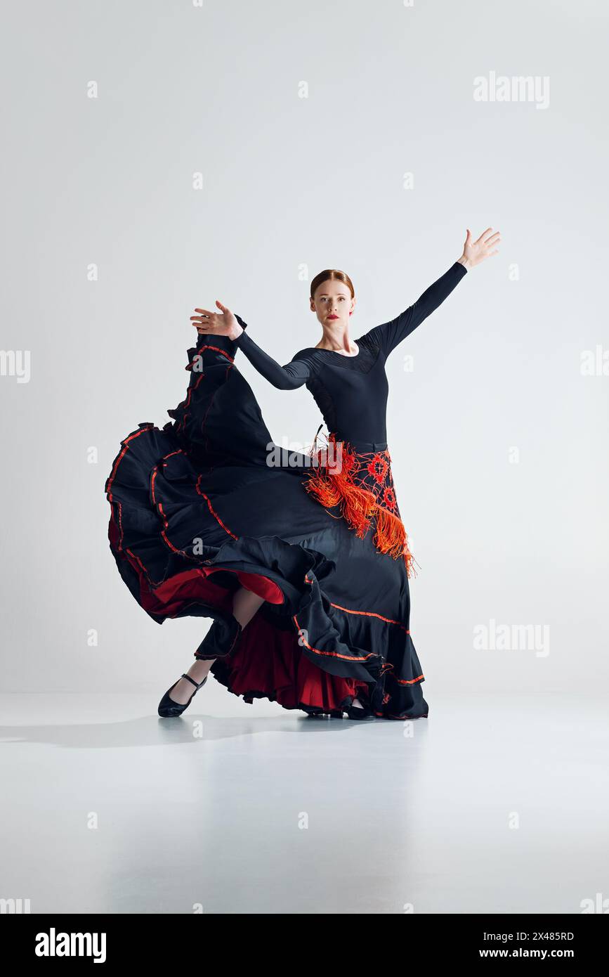 Dynamic portrait of female dancer, elegant woman performing with ...