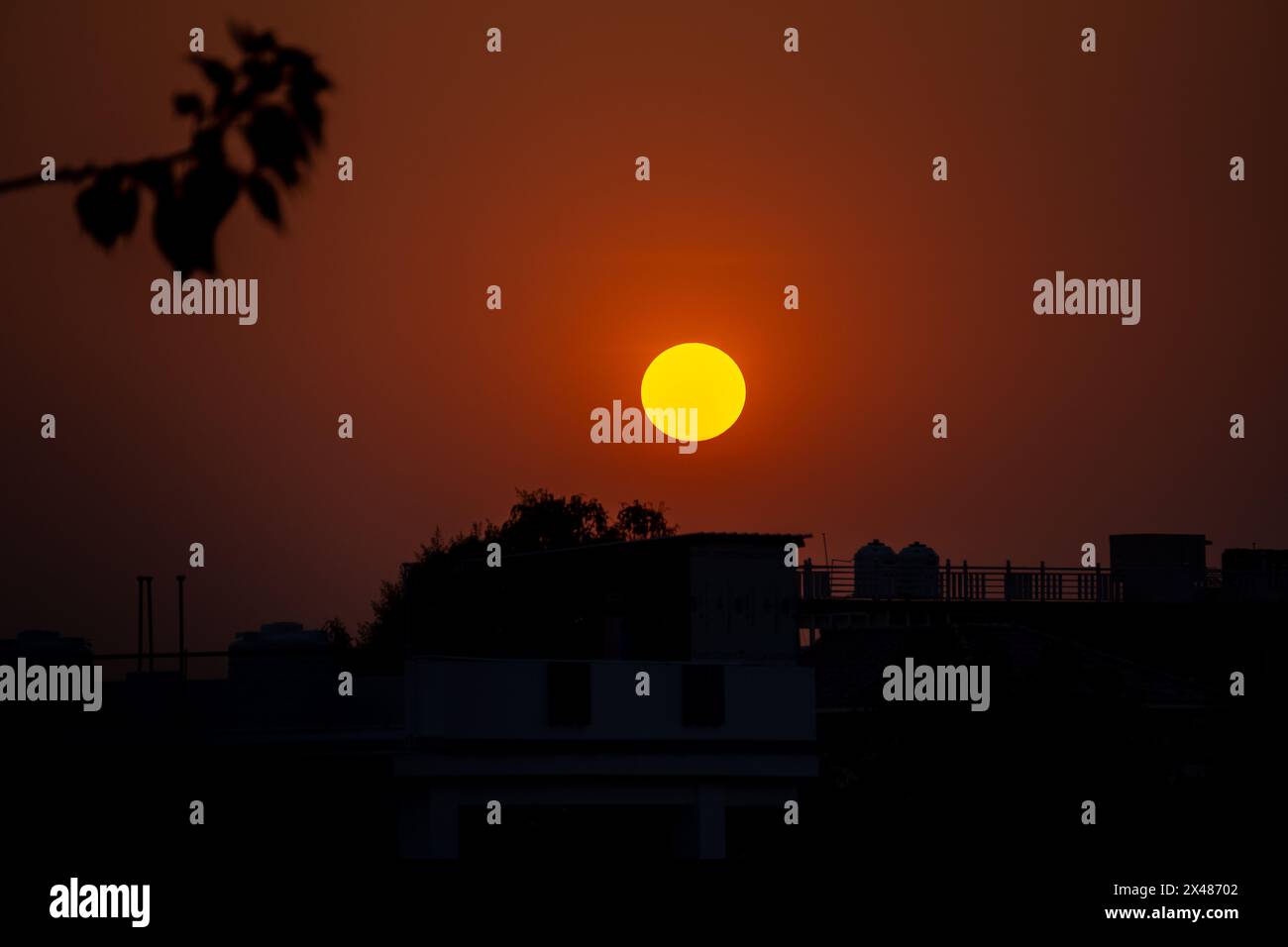 Experience nature's splendor with a vibrant sunset casting an orange ...