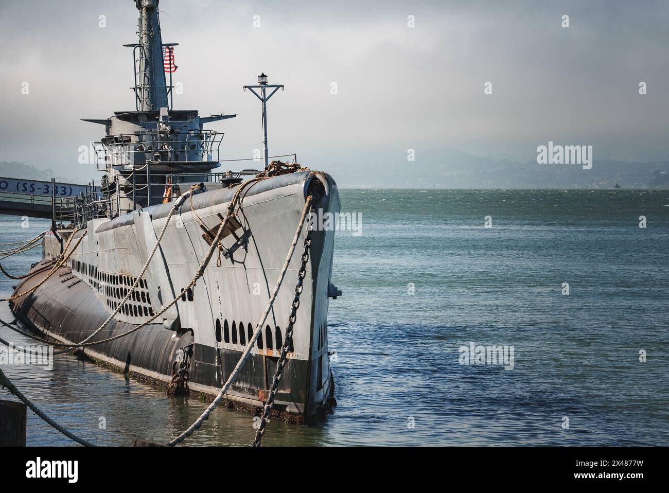 Naval vessel submarine with conning tower at San Francisco dock Stock ...