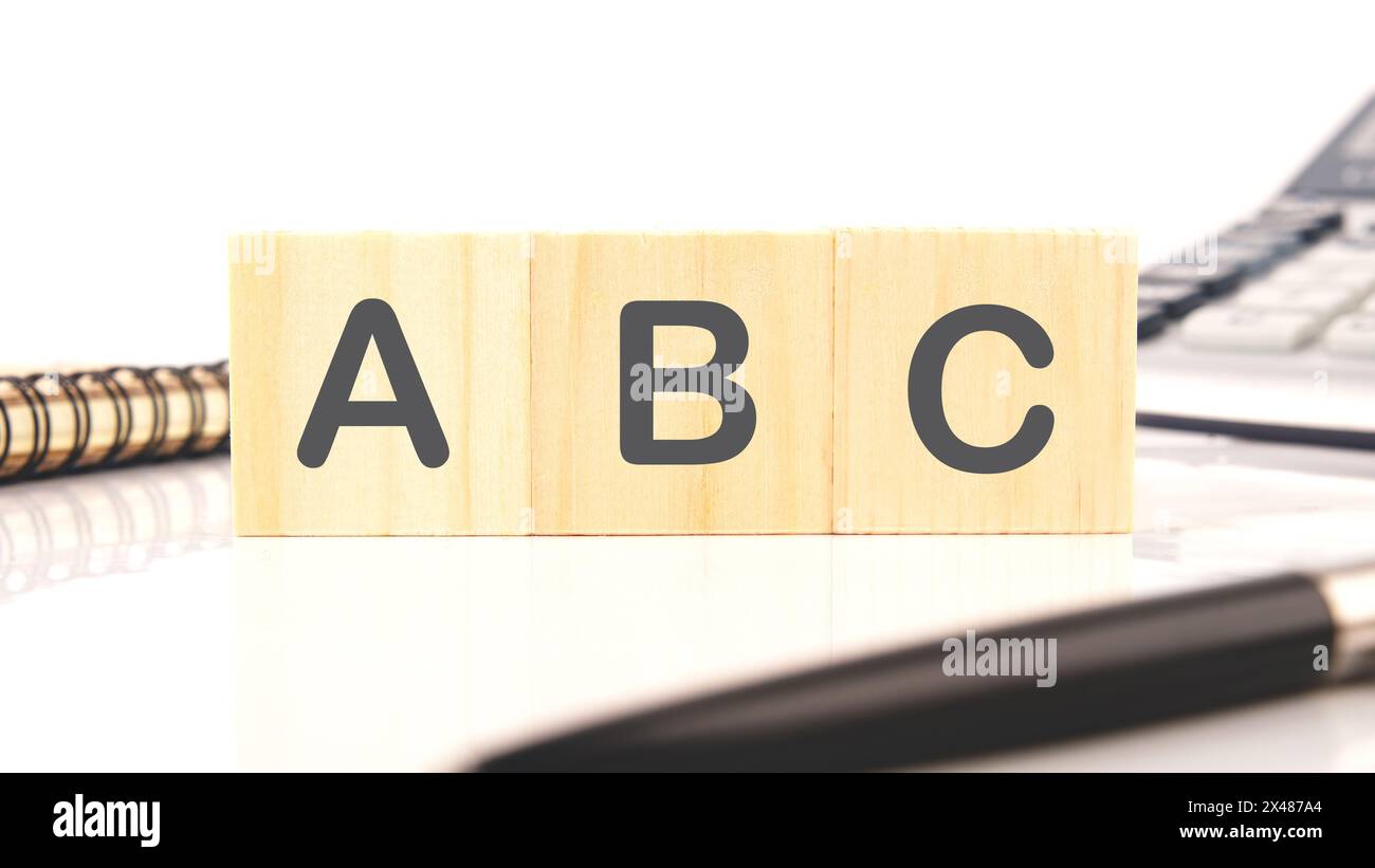 Wooden toy Blocks with the letters ABC on wooden cubes in a composition ...