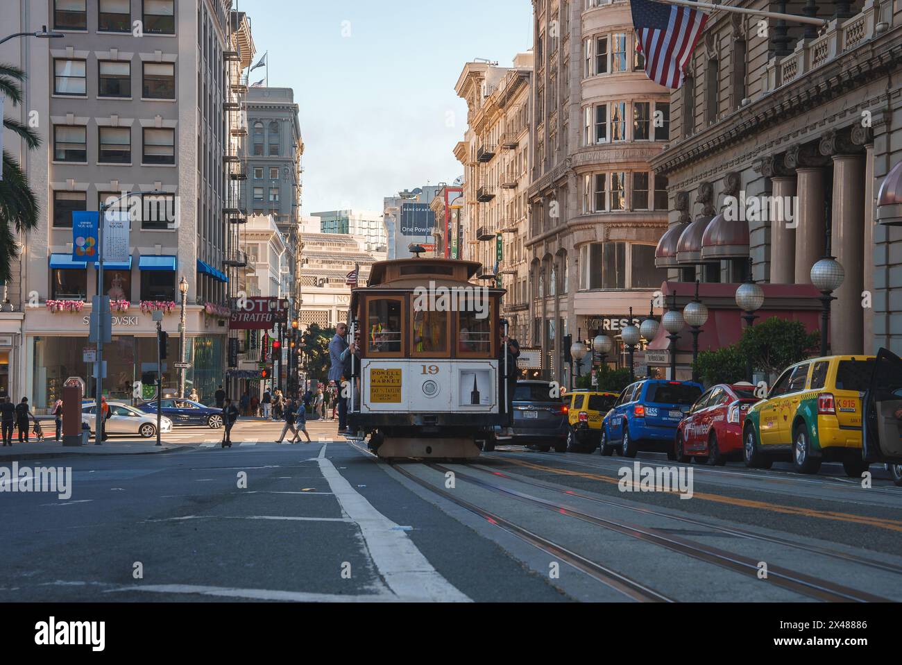 Iconic Cable Car Gliding Through San Francisco Street Stock Photo - Alamy