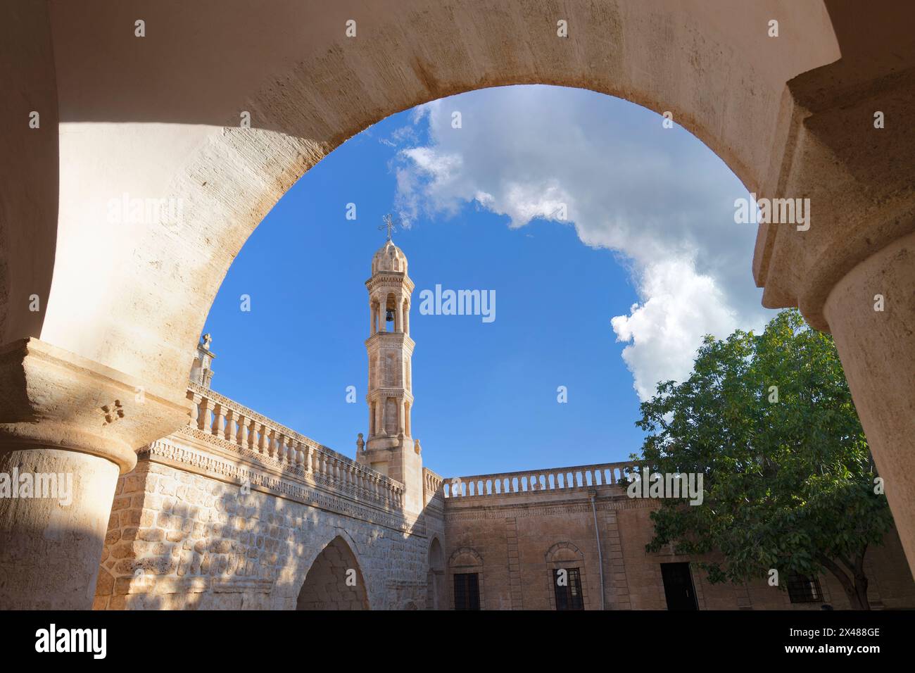 Syrian Orthodox Meyrien Ana Monastery and Church viewed through an arch ...