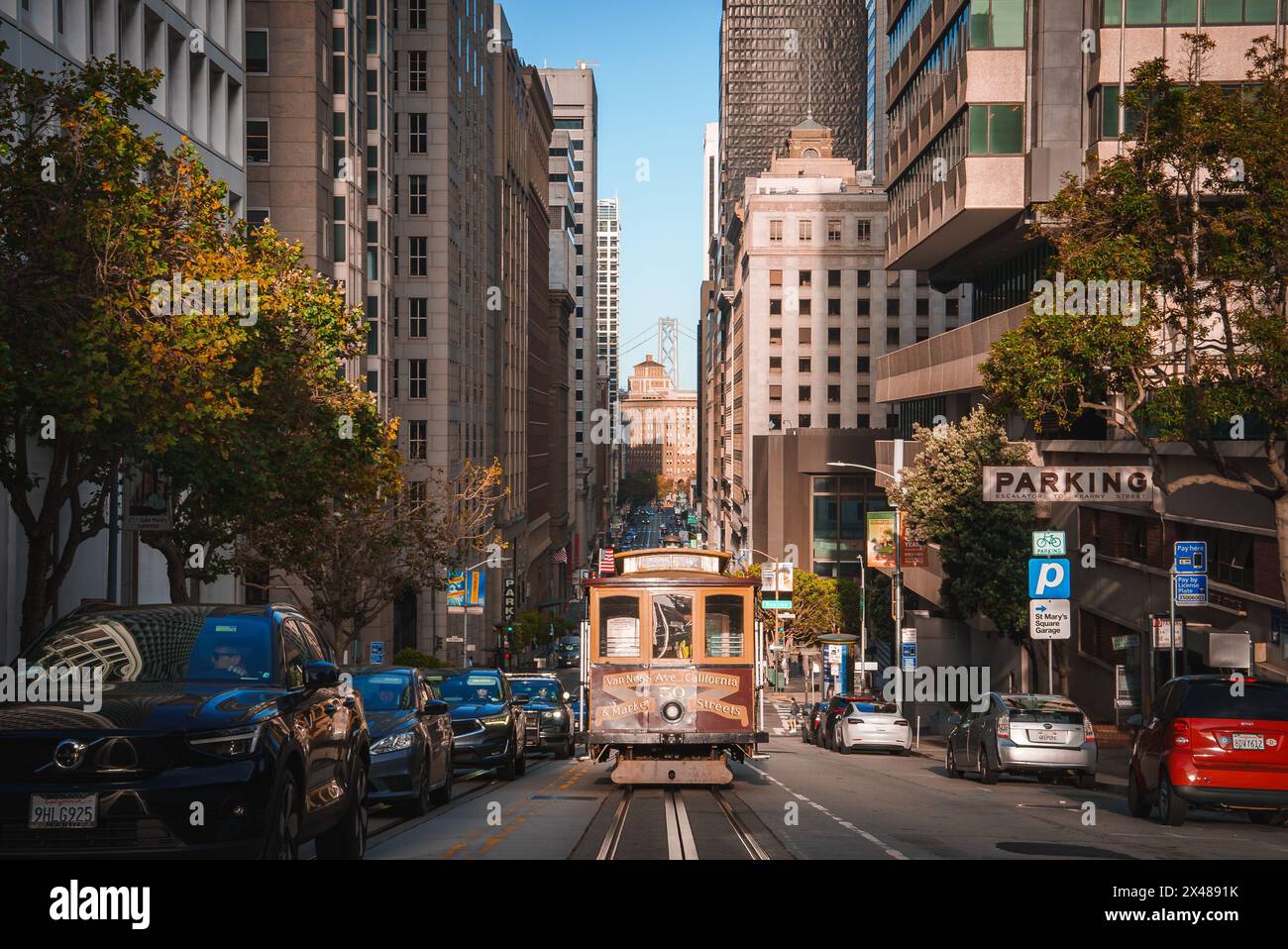 San Francisco urban scene with cable car, skyscrapers, and traffic ...