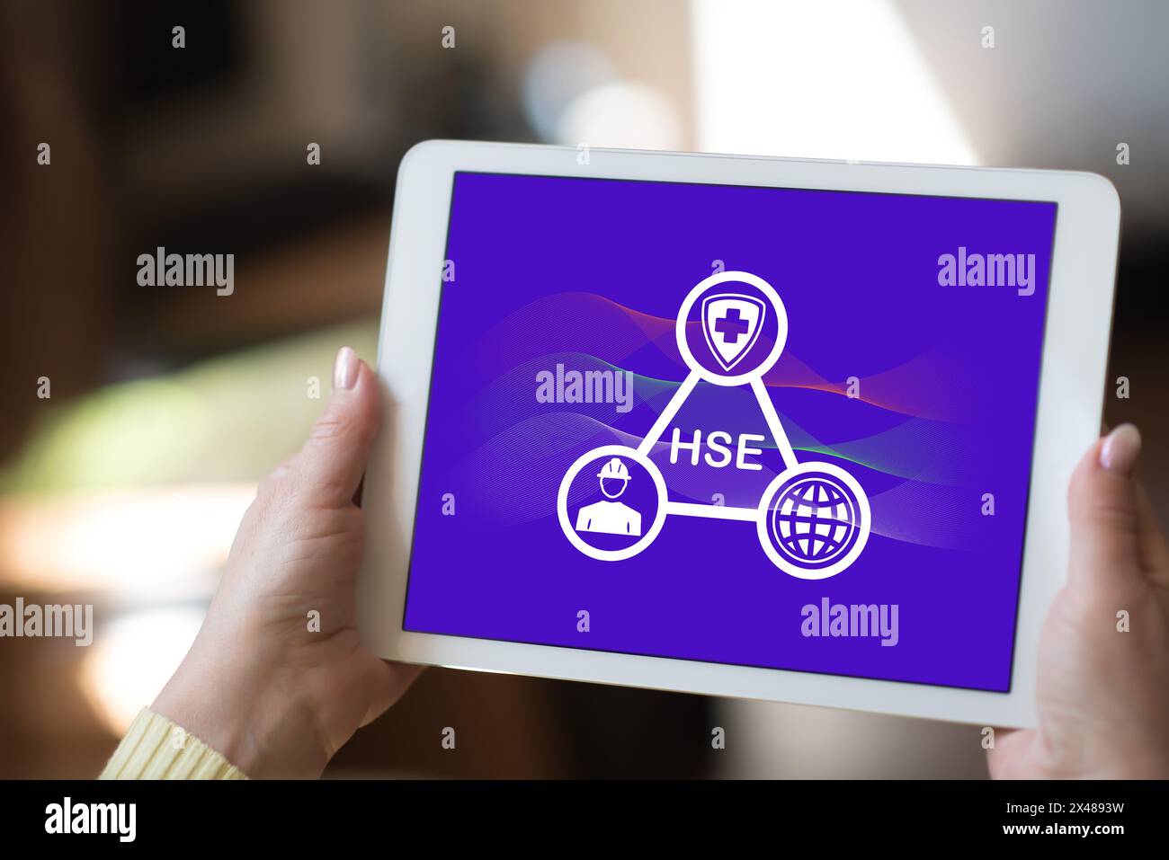 Tablet screen displaying a hse concept Stock Photo - Alamy