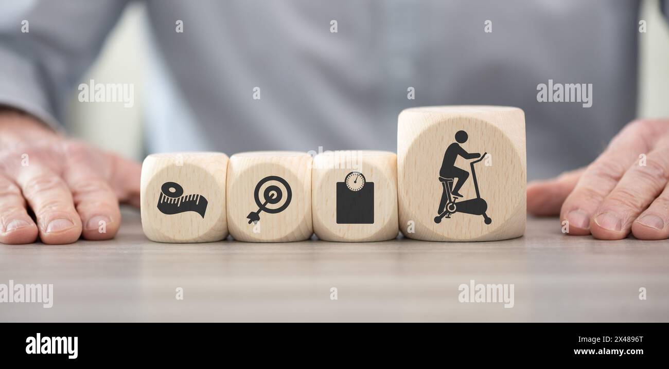 Wooden blocks with symbol of workout concept Stock Photo - Alamy