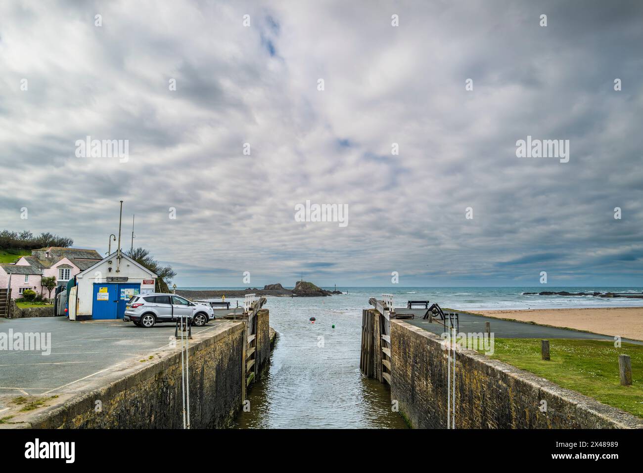 The open sea-lock gates on the historic Bude canal in Bude in Cornwall ...