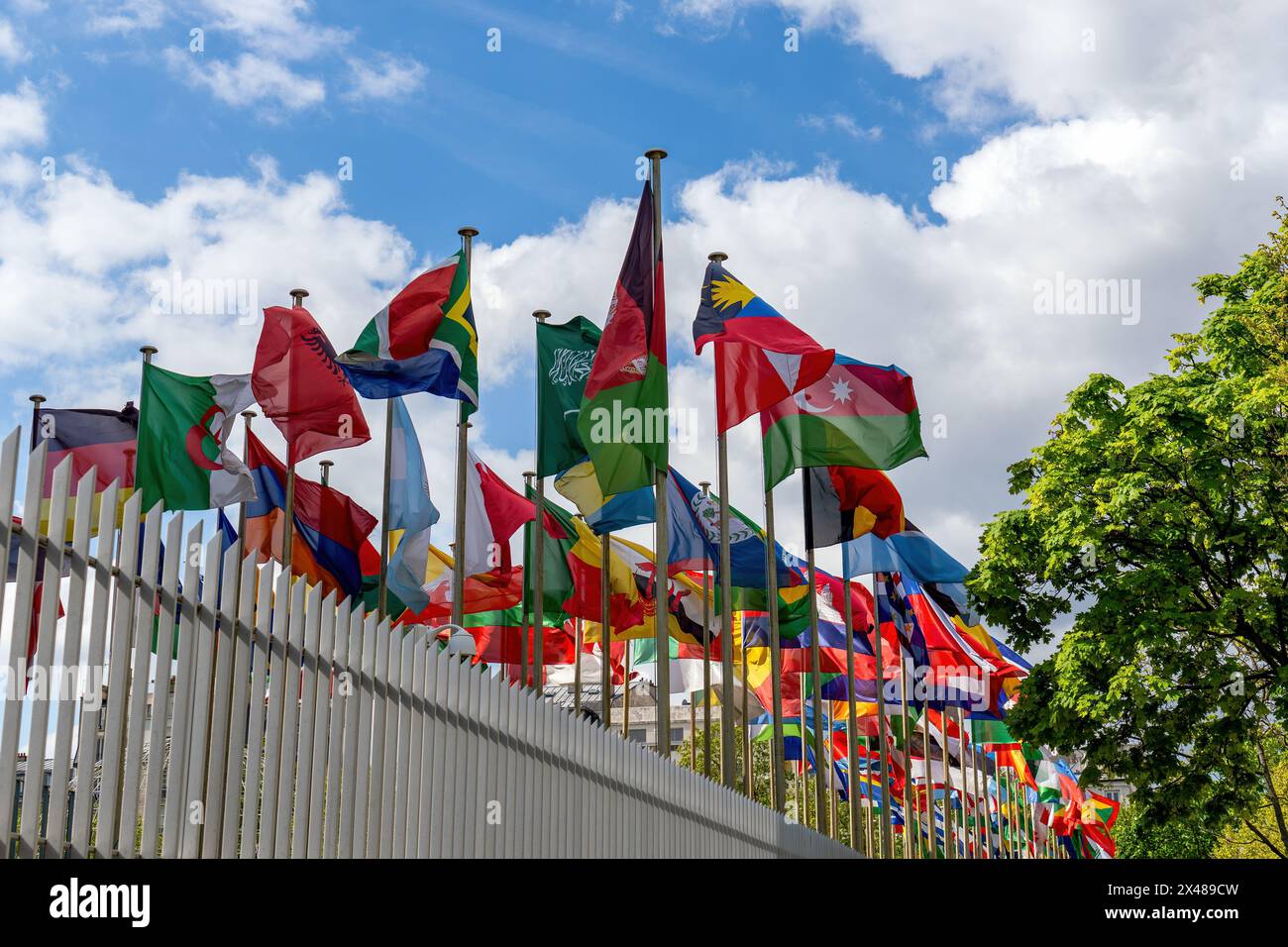 Flags fluttering in the wind in front of the UNESCO in Paris, France ...