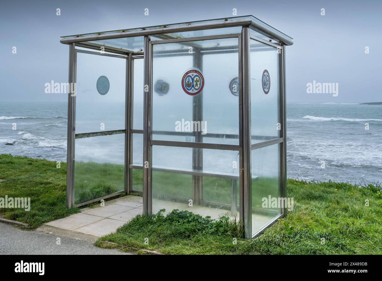 UK weather. Miserable, misty, dank weather over an empty bus stop ...