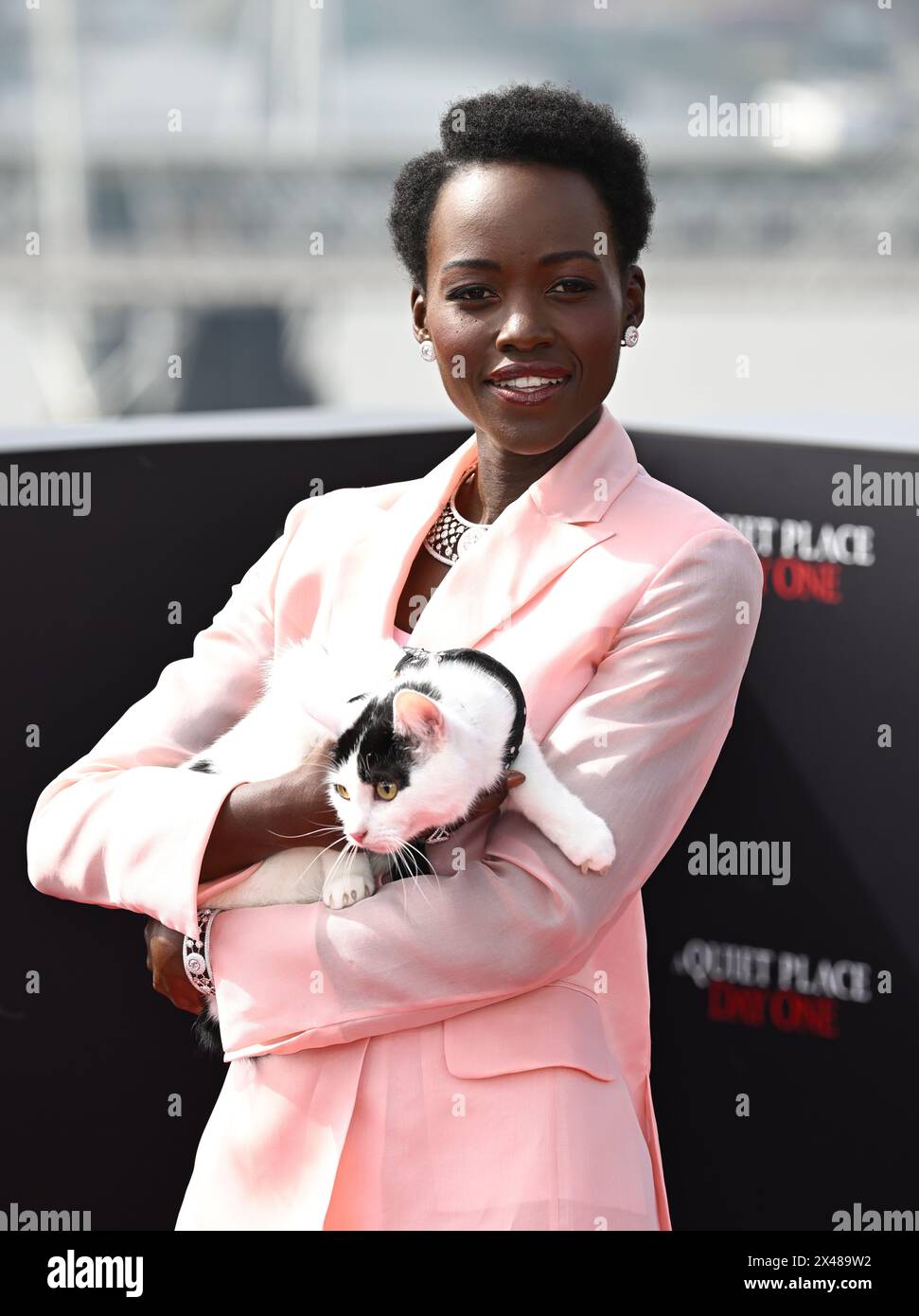 London, UK. May 1st, 2024. Lupita Nyong’o and Frodo the Cat at A Quiet ...