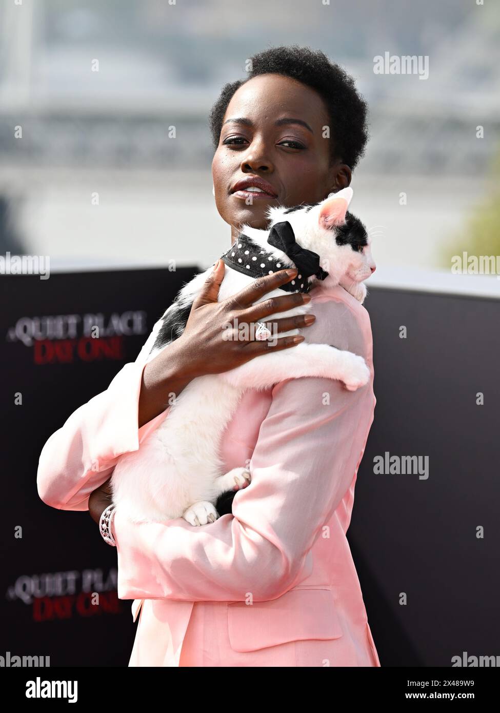 London, UK. May 1st, 2024. Lupita Nyong’o and Frodo the Cat at A Quiet ...