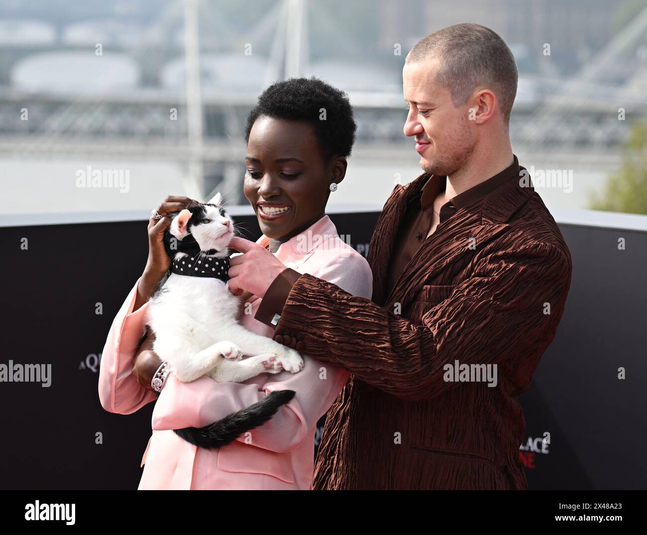 London, UK. May 1st, 2024. Lupita NyongÕo, Joseph Quinn and Frodo the ...