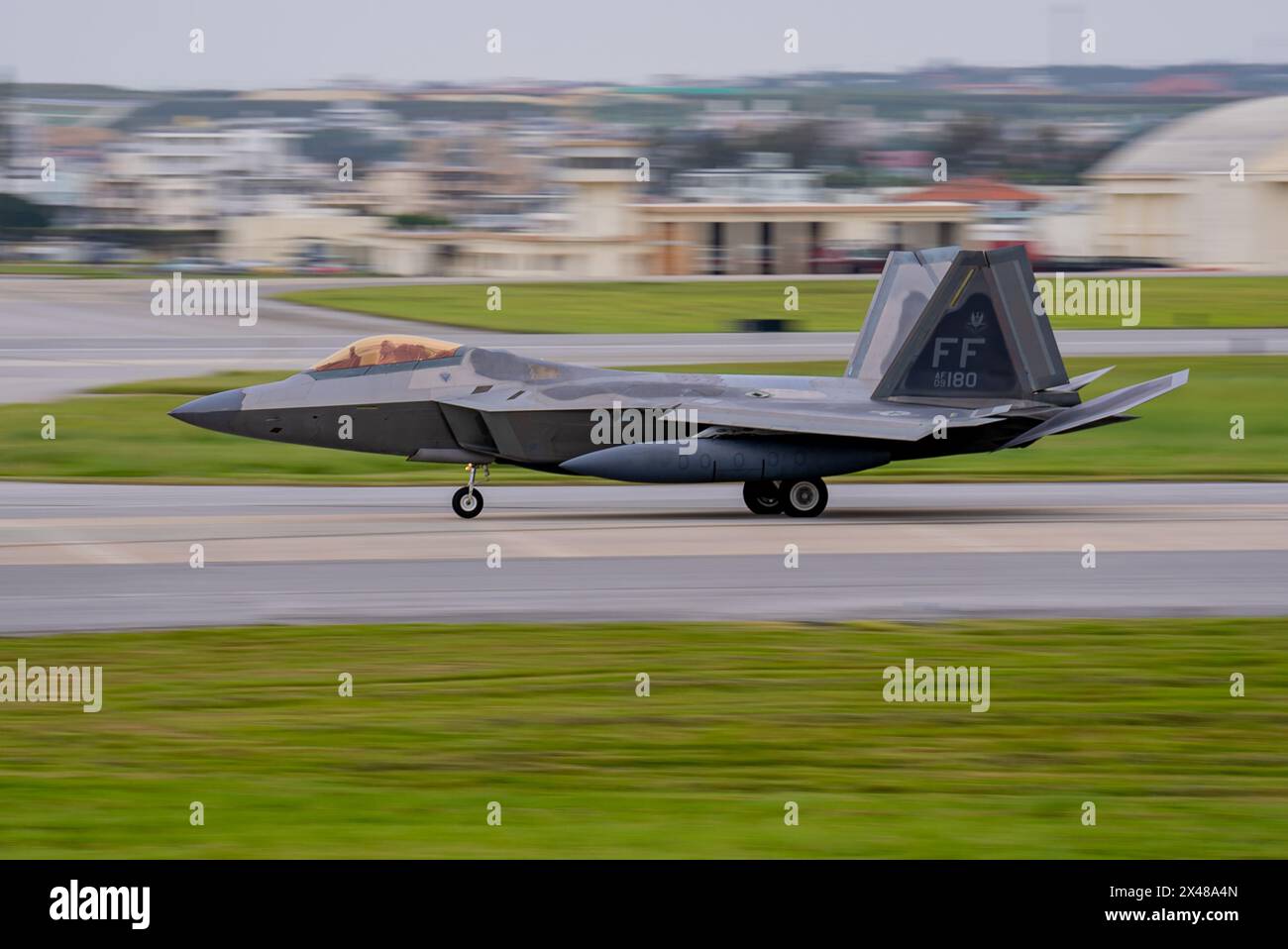A U.S. F-22A Raptor assigned to the 27th Fighter Squadron arrives at Kadena Air Base, Japan ...
