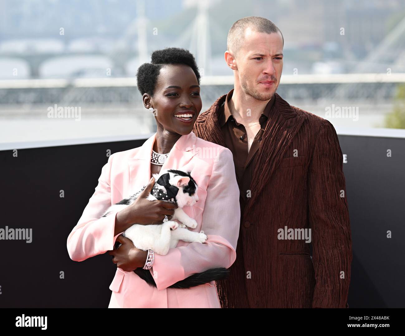 London, UK. May 1st, 2024. Lupita NyongÕo, Joseph Quinn and Frodo the ...