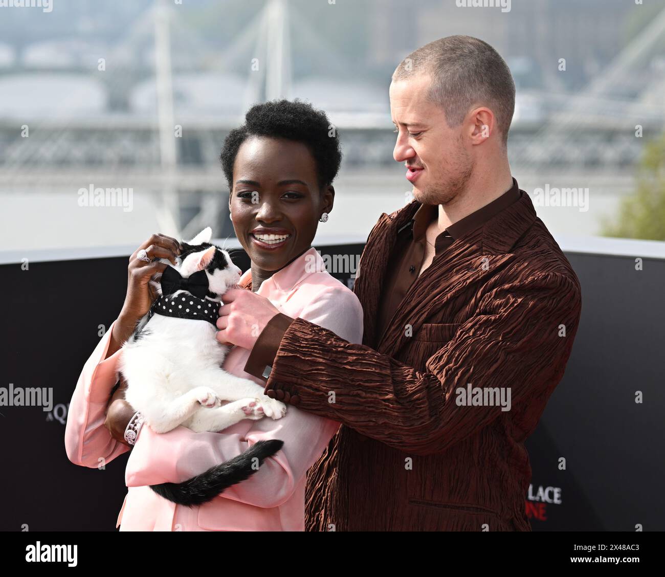London, UK. May 1st, 2024. Lupita NyongÕo, Joseph Quinn and Frodo the ...