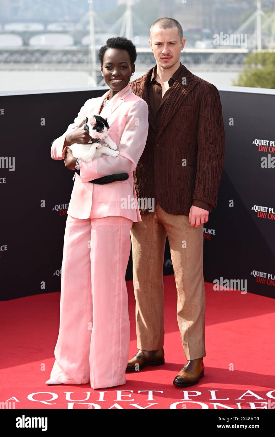 London, UK. May 1st, 2024. Lupita NyongÕo, Joseph Quinn and Frodo the ...
