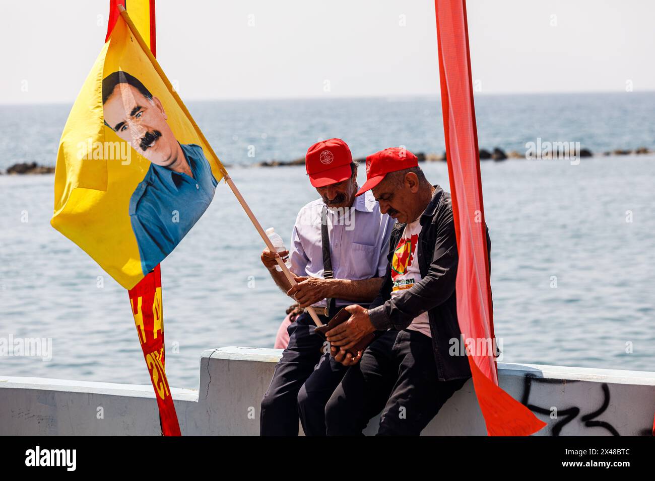 Limassol, Cyprus. 01st May, 2024. Two people are watching their phone ...