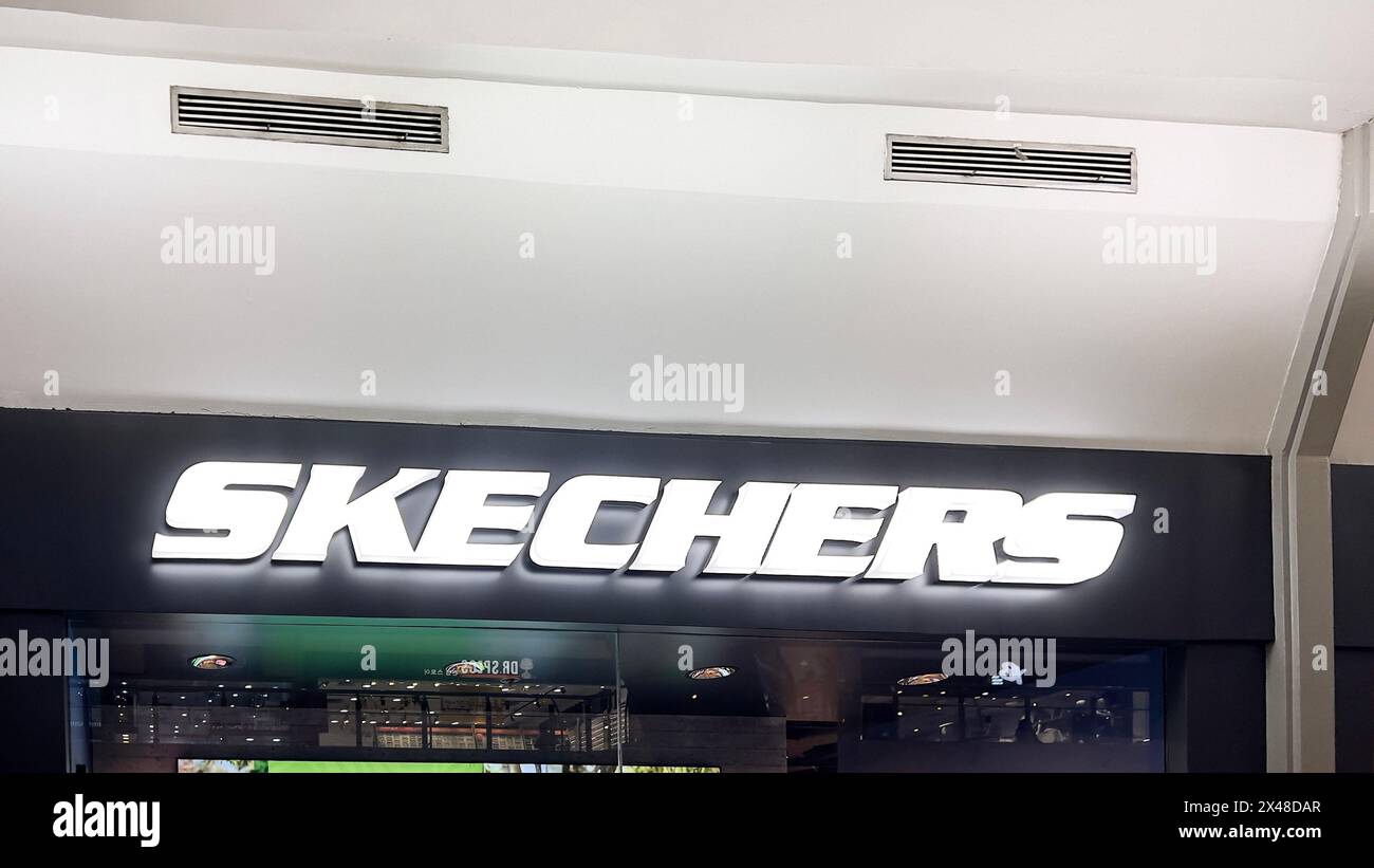 Skechers brand retail shop logo signboard on the storefront in the ...