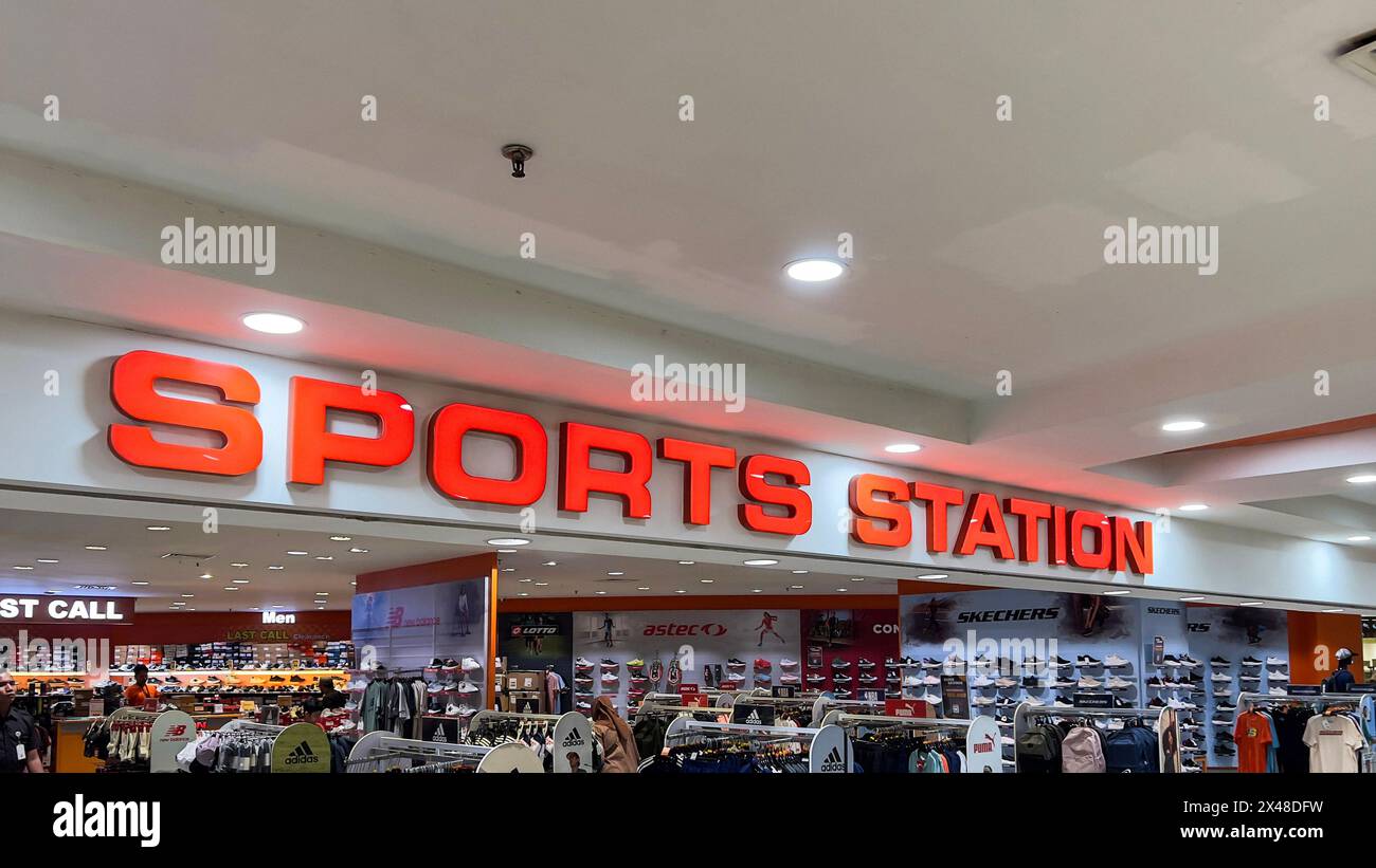 Sports Station brand retail shop logo signboard on the storefront in ...