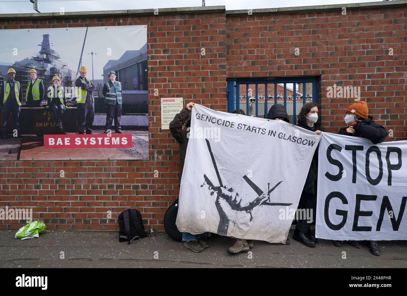 Protesters form a blockade outside weapons manufacturer BAE Systems in ...
