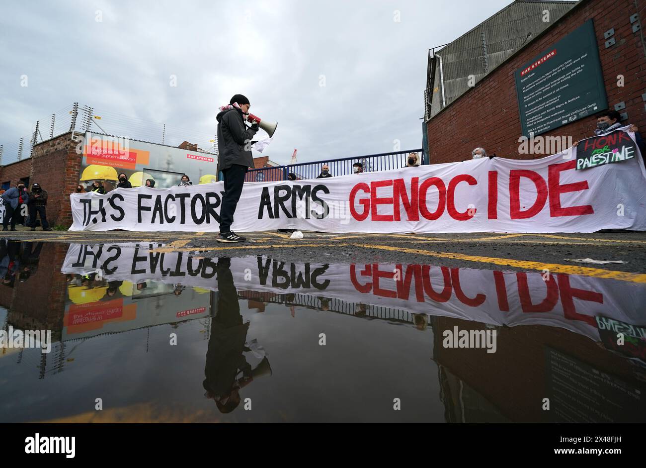 Protesters form a blockade outside weapons manufacturer BAE Systems in ...