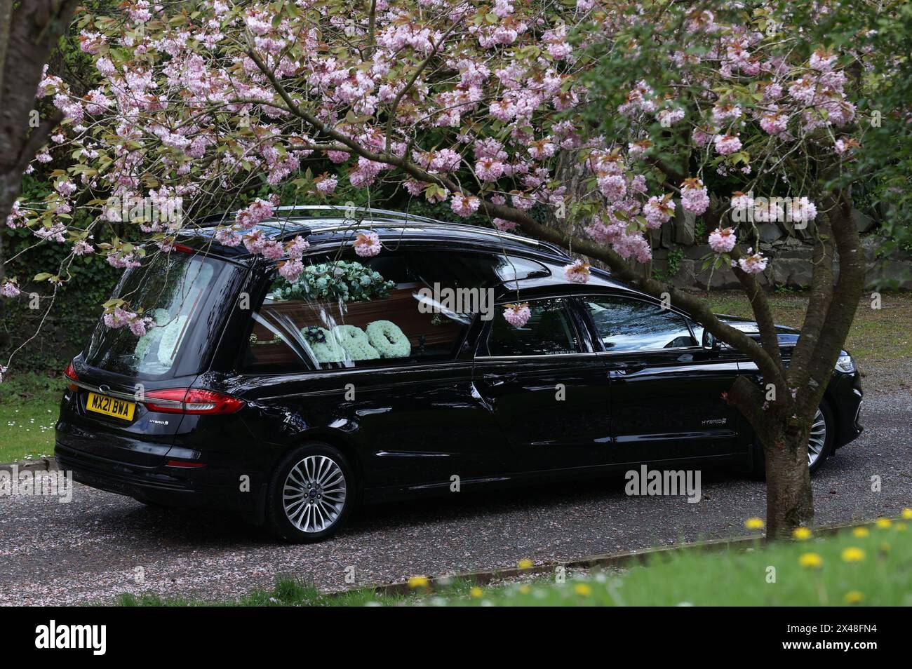 The hearse carrying the coffin of former BBC Northern Ireland political ...