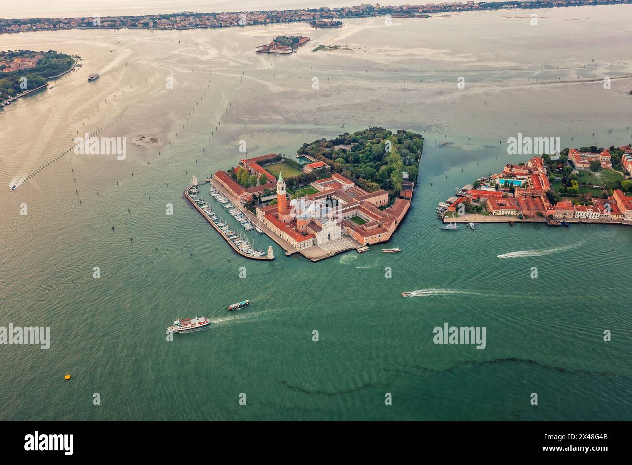 City island on water Venice, San Marco, Italy. Tiled roofs and ports ...